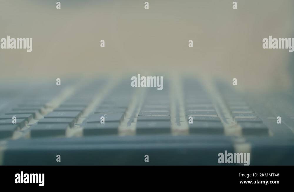 Keyboard of rugged laptop computer during dust resistance test - close ...
