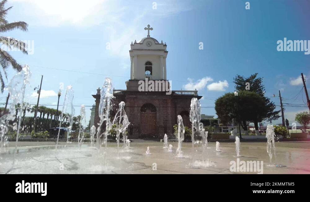 Temple of the Catholic Church of Esparza, animated fountain in front of ...
