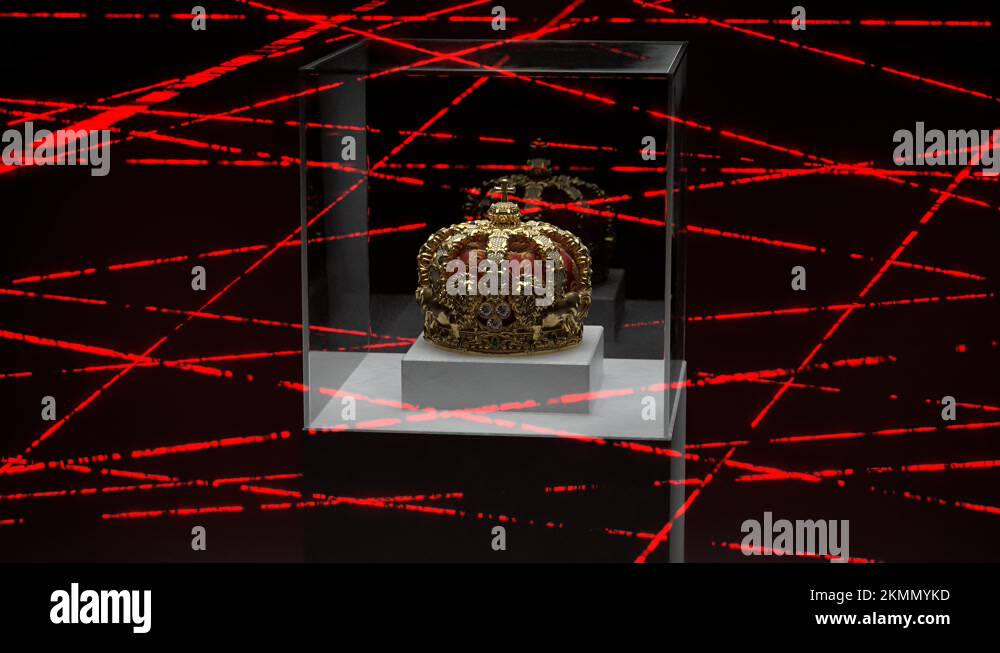 Beautiful golden crown. Valuable exhibit in museum protected by lasers ...