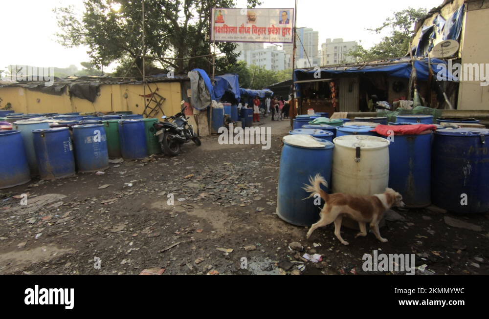 Big plastic drum kept in front of slum house, Mumbai, India Stock Video ...
