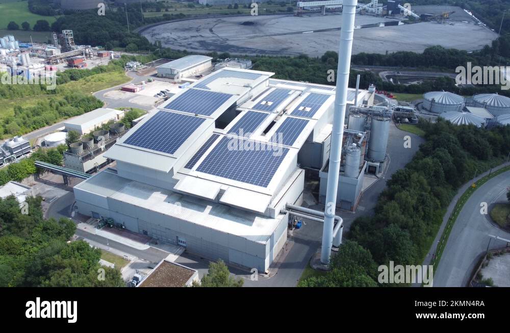 Clean solar rooftop installation on modern office building aerial view ...