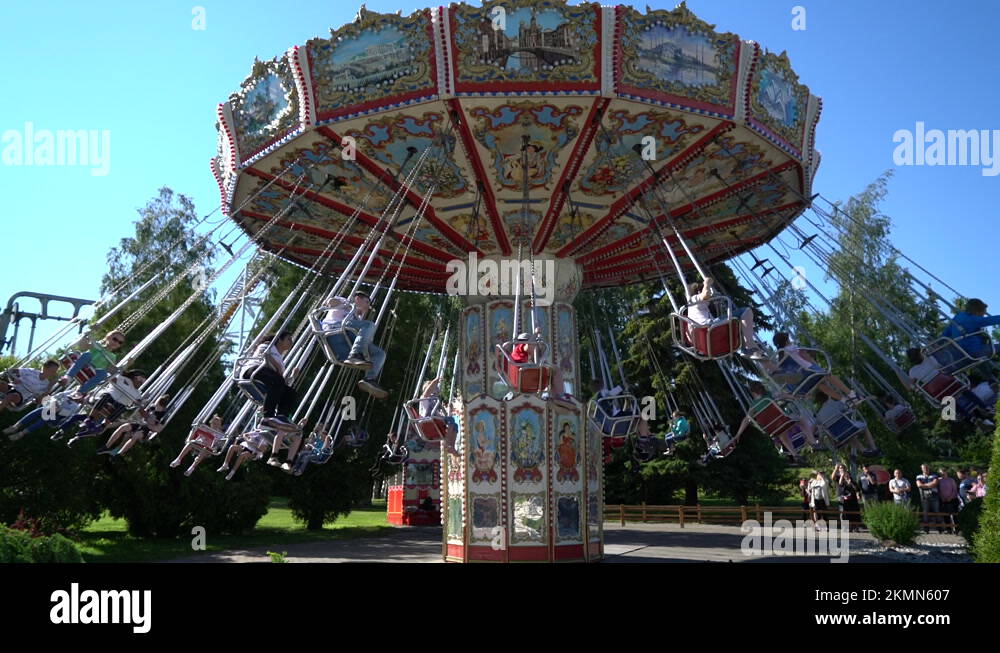 Extreme carousels for kids in an amusement park. Carousel. Park of ...