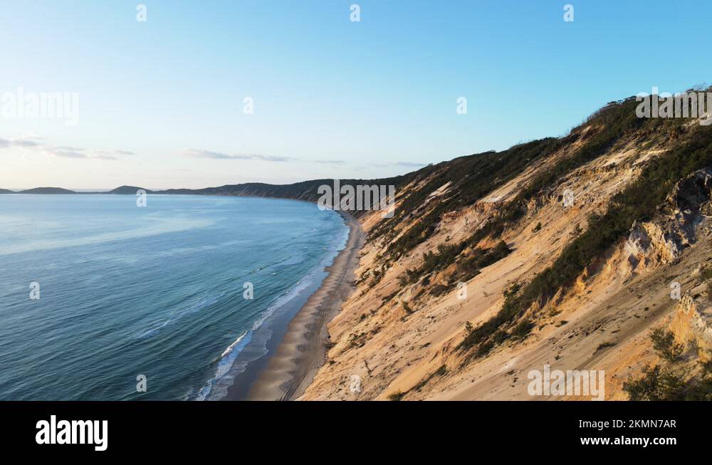 Drone view of the constantly re-sculpt cliff lines of coloured sands at ...