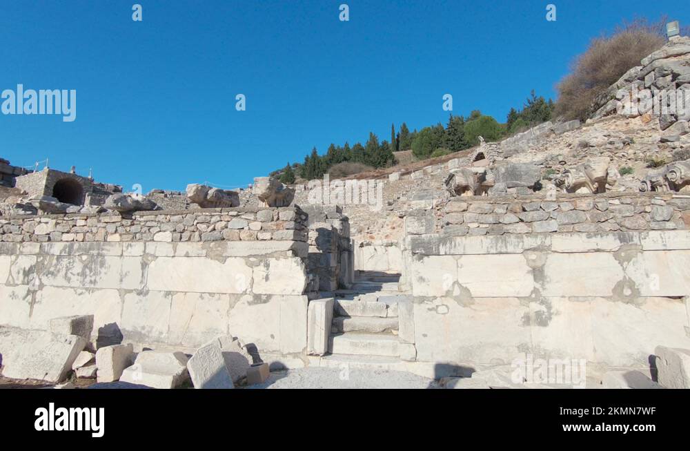 Walk through broken columns entering the Odeon amphitheater in ancient ...