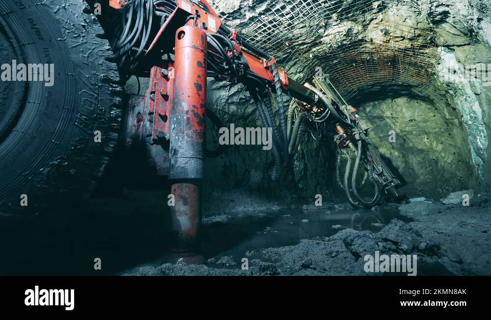 Boring mechanism is irrigating an ore mine Stock Video Footage - Alamy