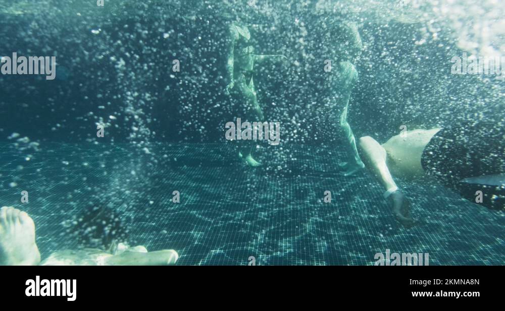 Friends underwater in swimming pool Stock Videos & Footage - HD and 4K ...