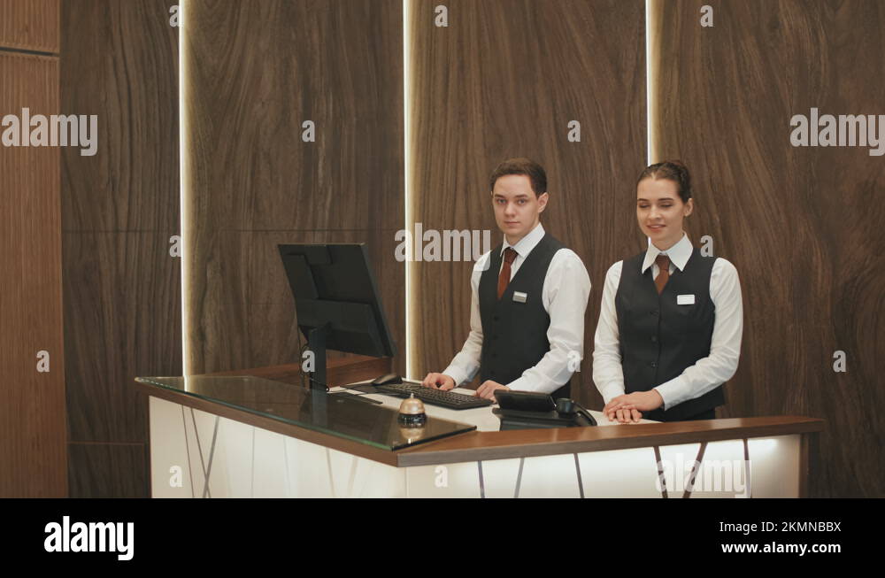 Portrait two receptionists hotel reception Stock Videos & Footage - HD ...