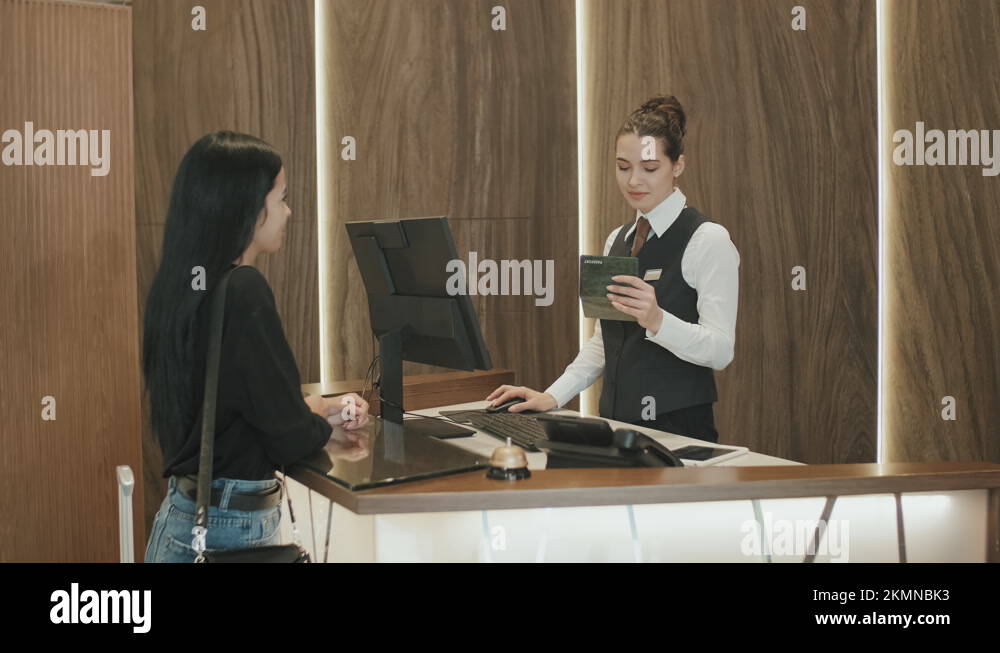 Lady Checking-In at Hotel Stock Video Footage - Alamy