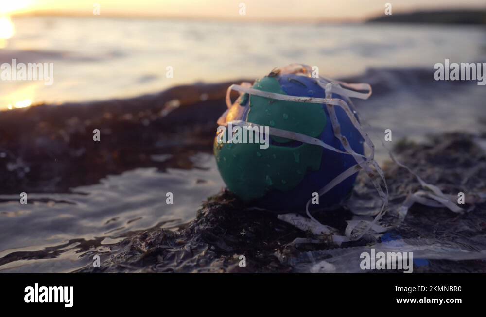 dirty earth model in water, earth pollution concept, wasted earth ...