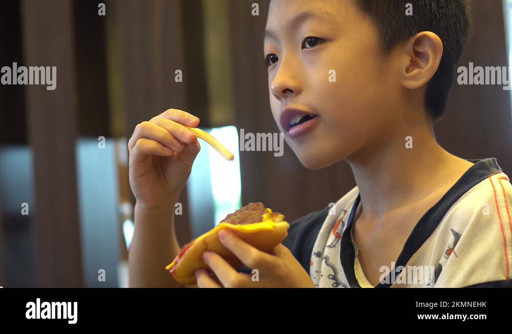Kid french fries Stock Videos & Footage - HD and 4K Video Clips - Alamy