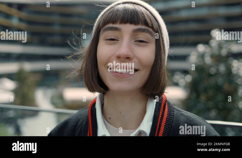 Woman with piercing in nose posing at shopping mall Stock Video Footage ...