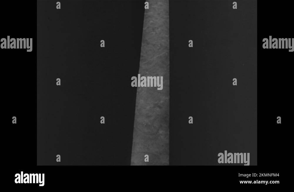 1940s: Bomber planes in sky. Bomb hatch opens. Multiple bombs fall from ...