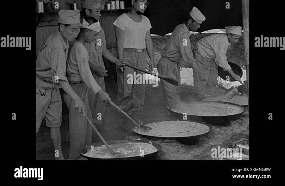 1940s: POWs unloading truck and stacking boxes, POWs cook in large woks ...