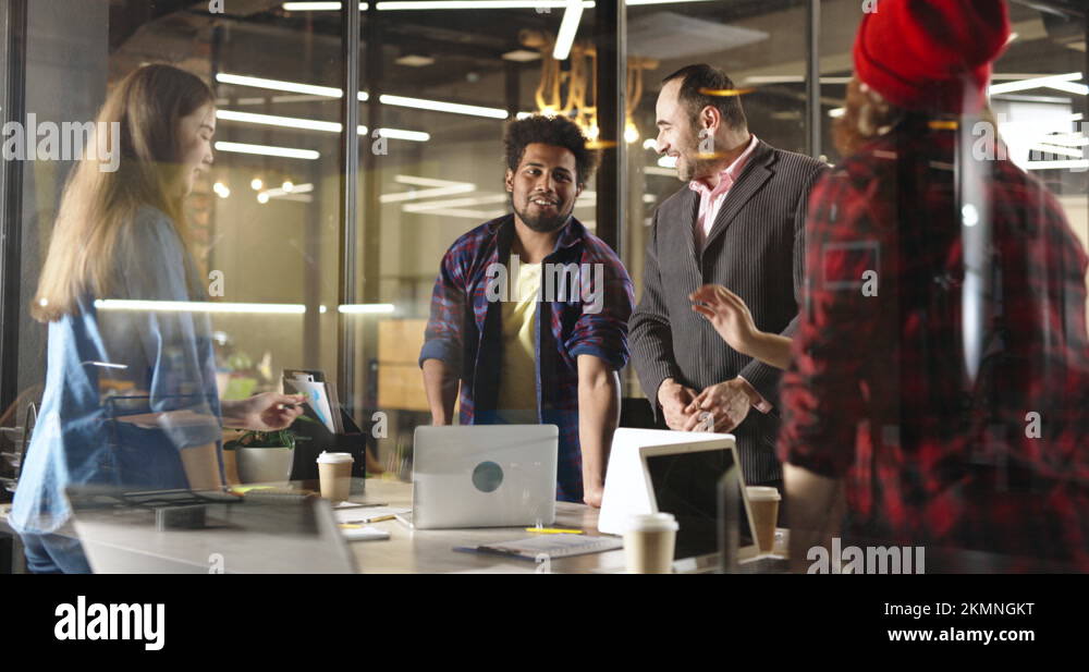 Team of diverse students working on project, doing a highfive. Students ...