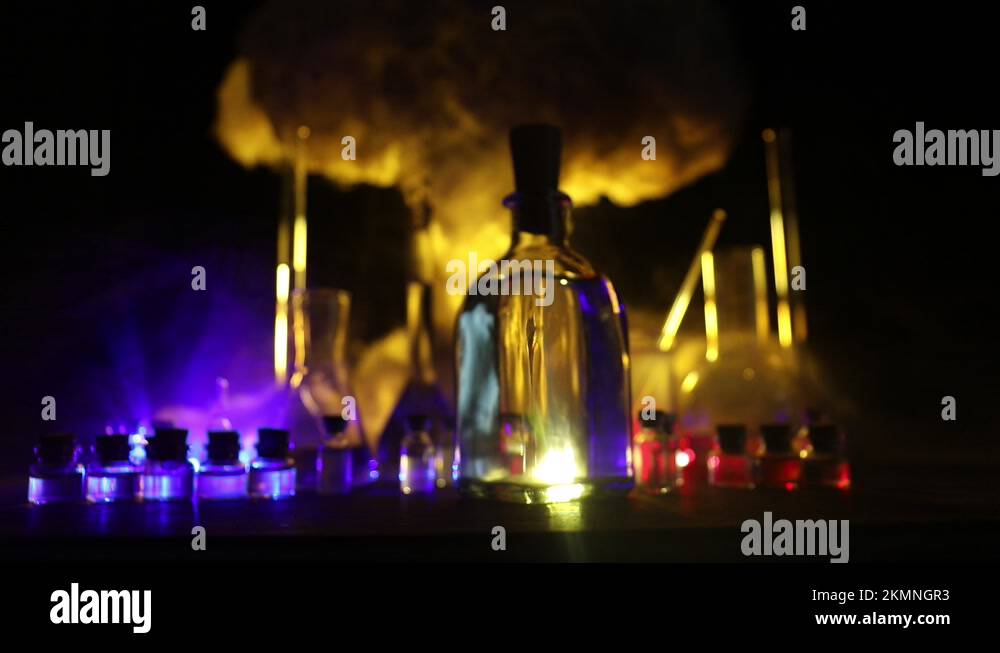 Laboratory test tubes on abstract explosion cloud background Stock ...