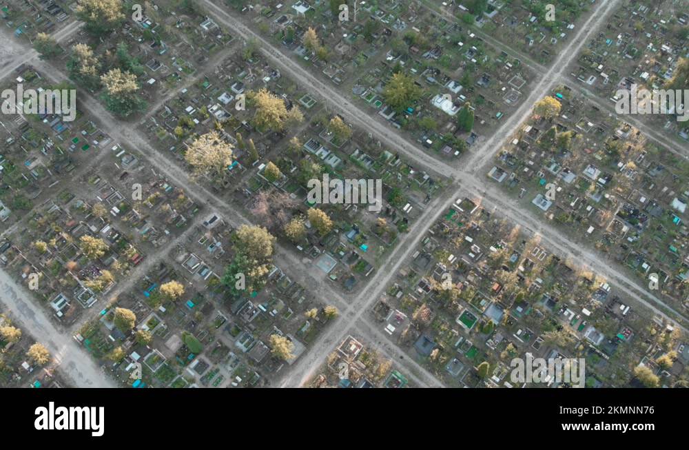 Cemetery at sunset. Flying over headstones at graveyard. Christian ...