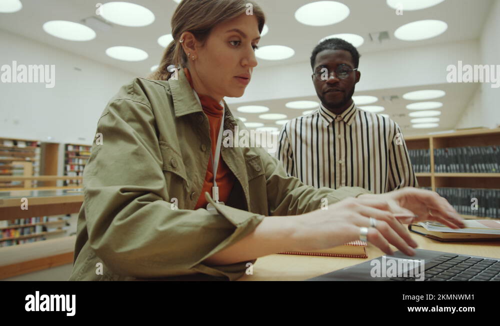 Library worker Stock Videos & Footage - HD and 4K Video Clips - Alamy