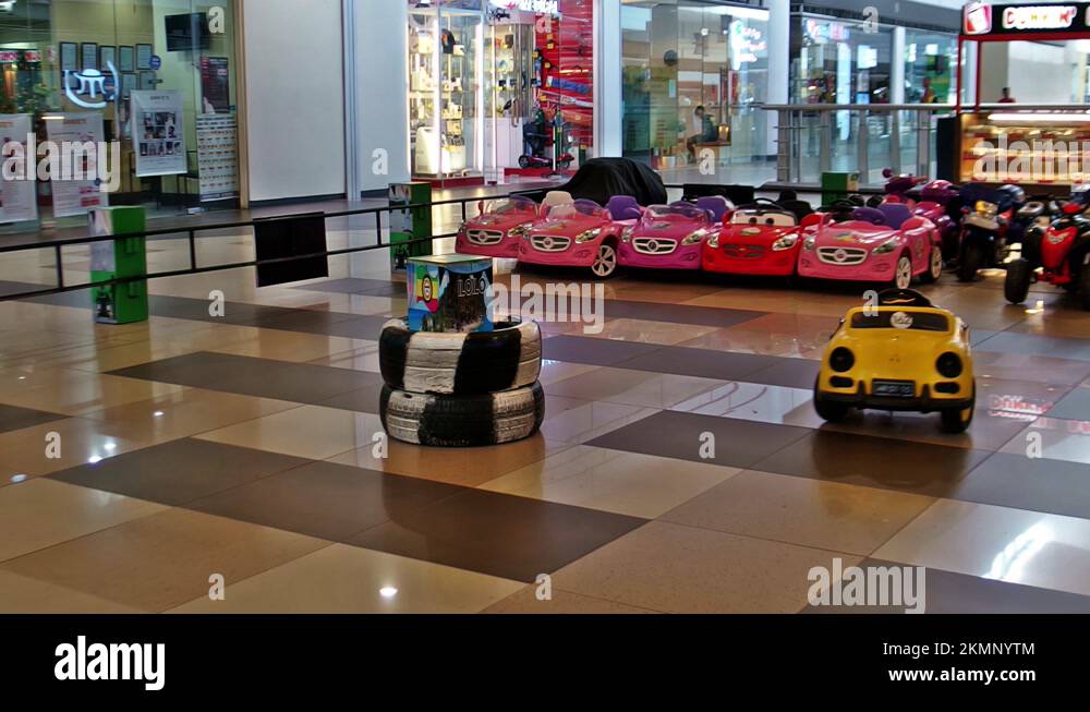 Toy car being left to run in circles by itself to attract passing ...