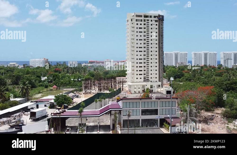 drone scene from above showing building under construction in tourist ...