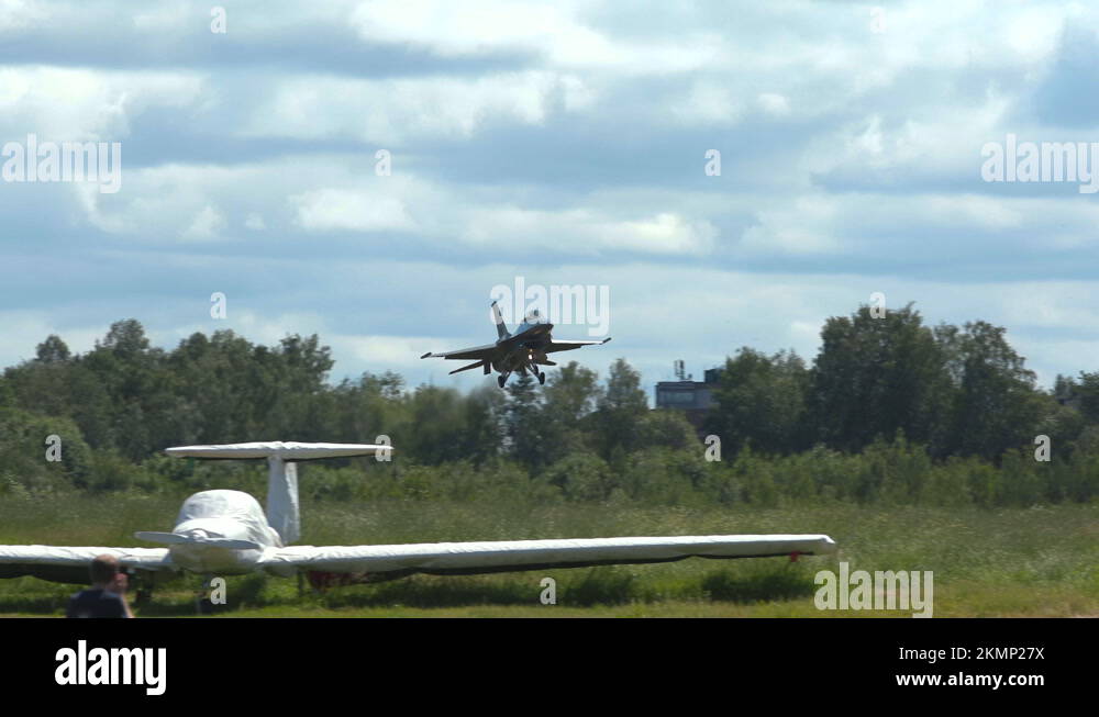 airplane military f16b jet fighter landing deploy brake parachute ...