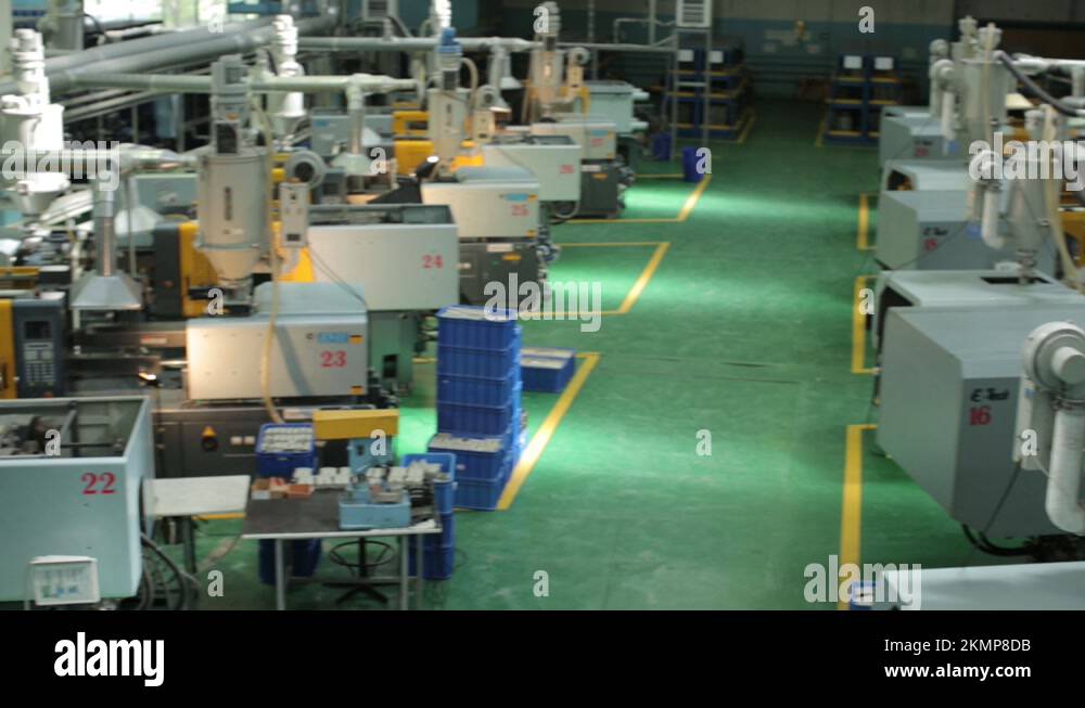 Automation of the plastic molding process molding of plastic Stock ...