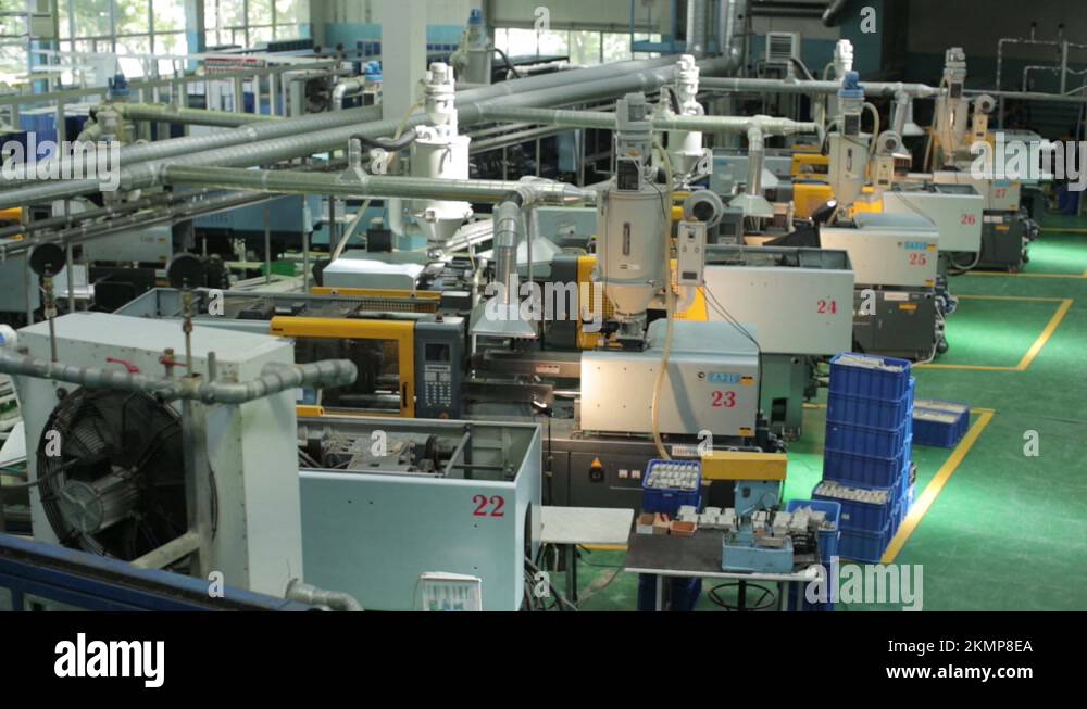 Automation of the plastic molding process molding of plastic Stock ...