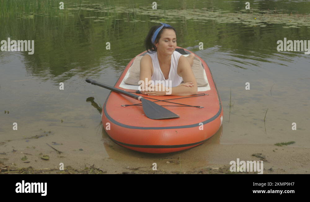 Sunbathing on paddle board Stock Videos & Footage - HD and 4K Video ...