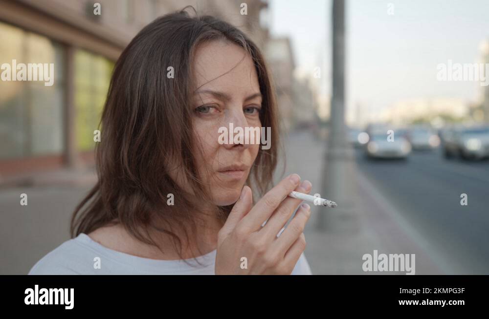 Woman smoking cigarette summer Stock Videos & Footage - HD and 4K Video ...