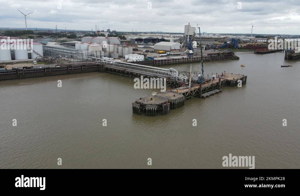 Jetty dock ,Cemex storage Plant Essex on river Thames Aerial footage ...