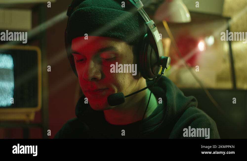 Hacker typing on keyboard at night, breaking password, wearing ...