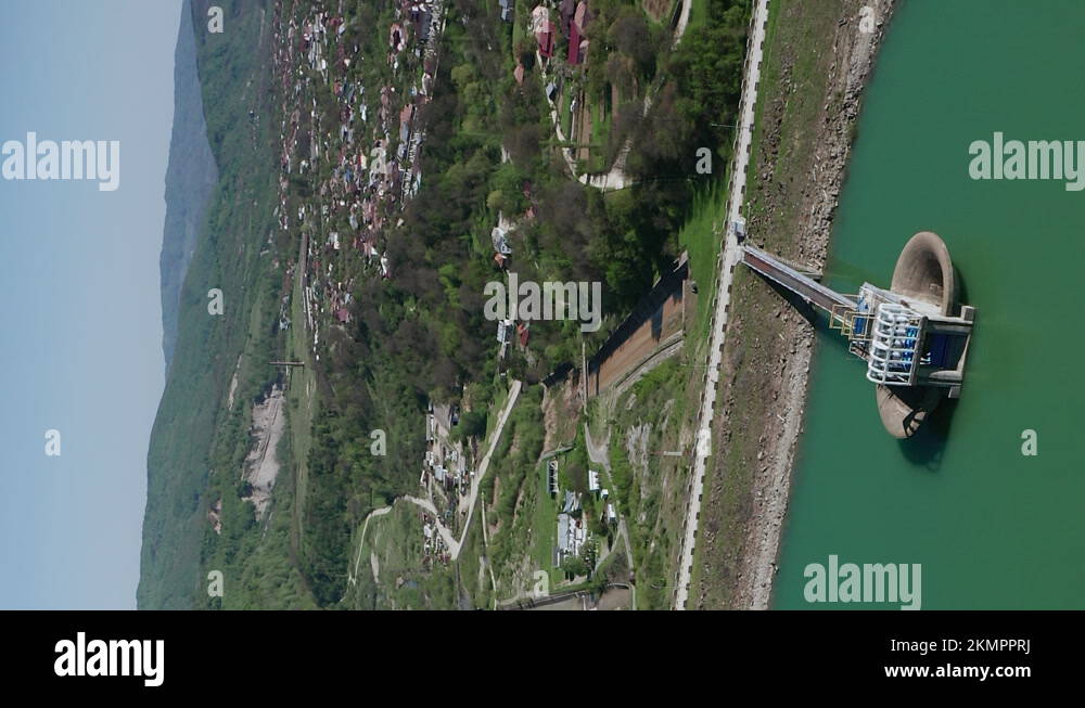 Vertical flyover above hydroelectric equipment at Maneciu Dam, Romania ...