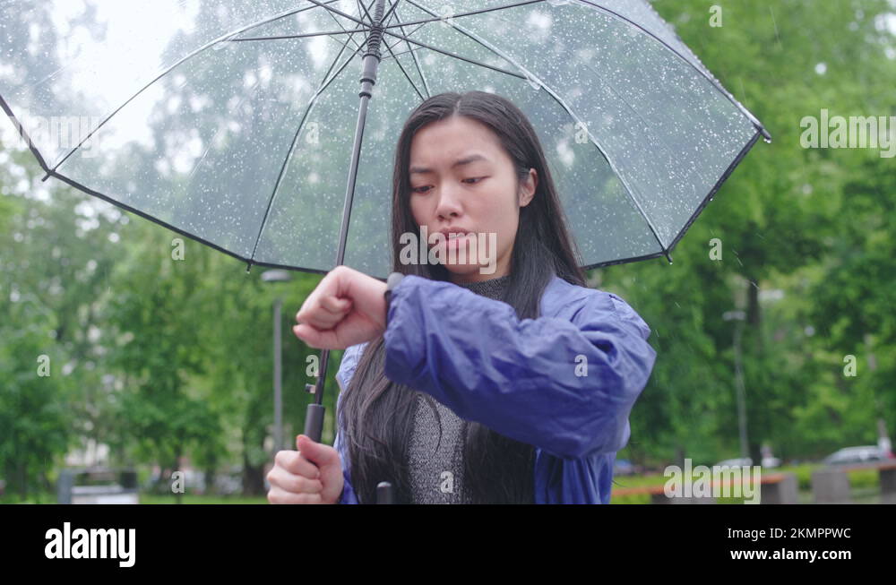 Woman waiting rain Stock Videos & Footage - HD and 4K Video Clips - Alamy