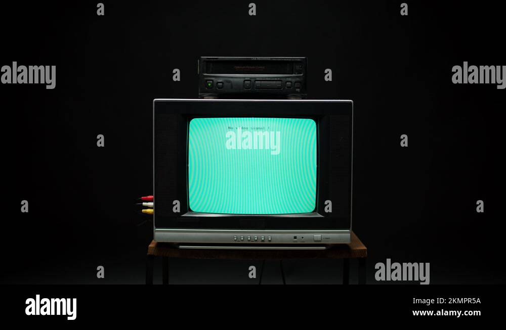 Old retro square television with blue screen on black background. Old ...