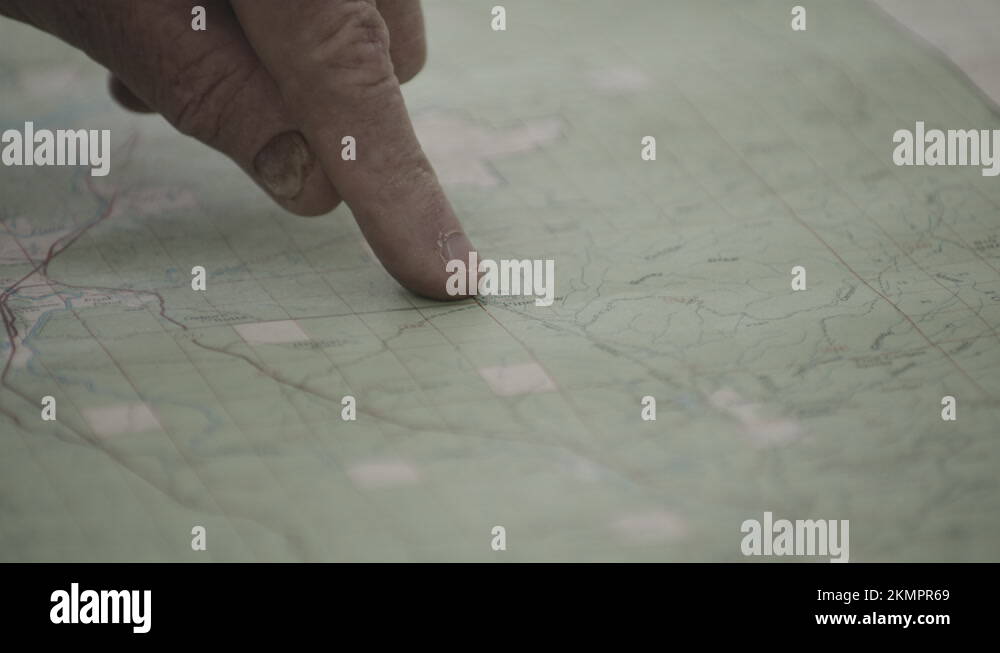 Wrinkled Finger Pointing On Geographical Map Of West Yellowstone In ...
