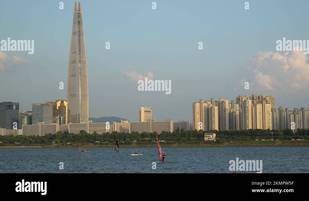 Lotte World Tower and Jamsil district on Sunset from the riverbank of ...