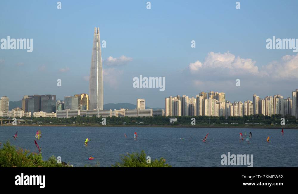 Windsurfing on the Han river in Seoul, South Korea. Many people ...