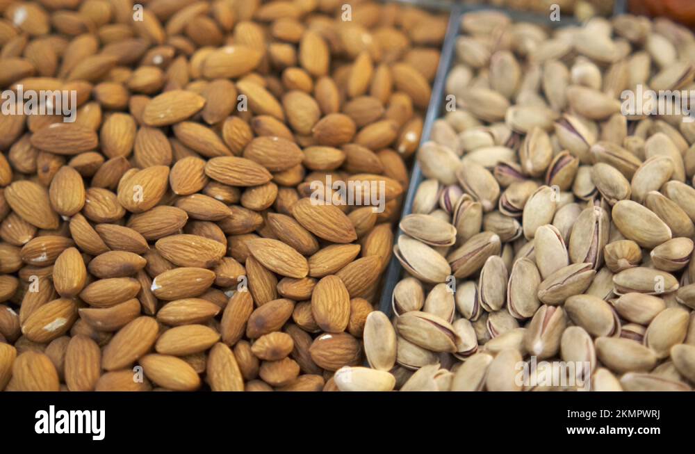 Large Counter of Dried Fruits and Nuts at a Farmers Market . Nuts, dry ...