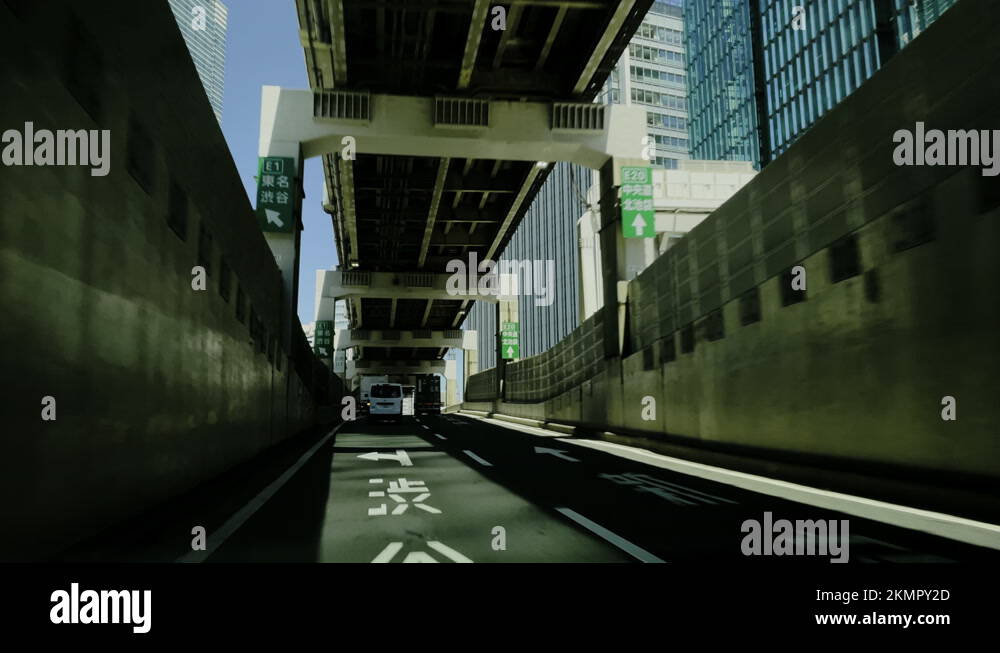 Emerging From Tunnel And Driving Under Overpass In Tokyo, Japan Stock ...