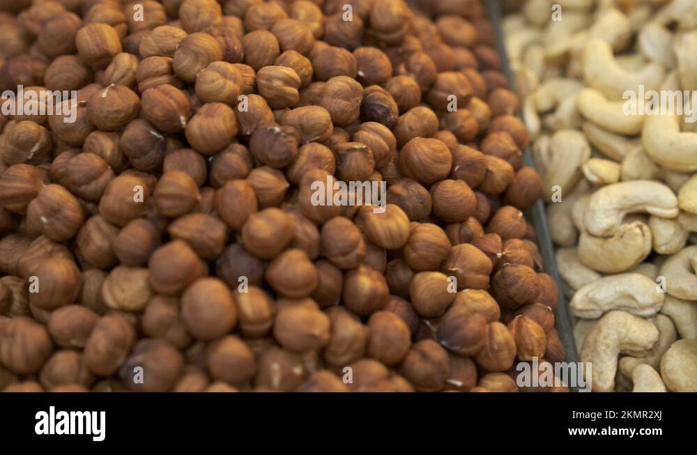 Large Counter of Dried Fruits and Nuts at a Farmers Market . Nuts, dry ...