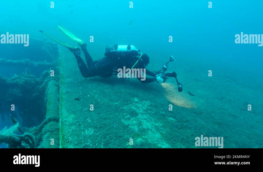 Scuba diver photographer shots on th shipwreck Swedish ferry MS Zenobia ...