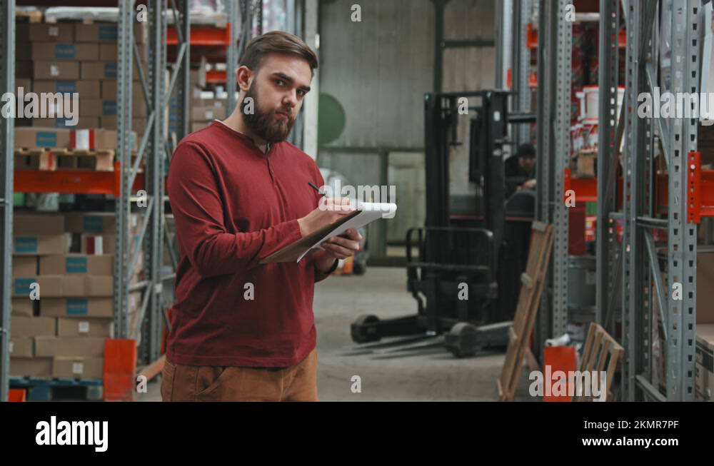 Man in warehouse checking Stock Videos & Footage - HD and 4K Video ...
