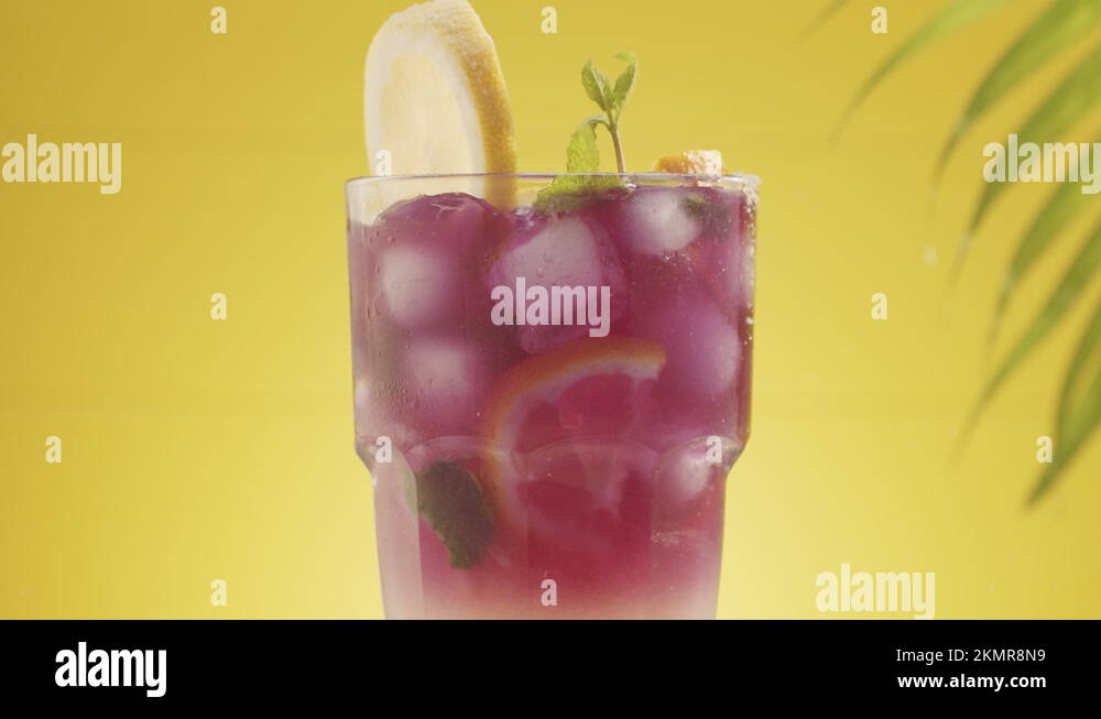 Refreshing soft drink Lemonade with ice and mint with slice of lemon ...