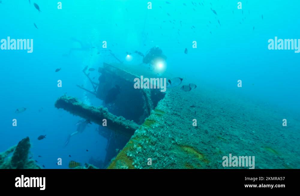 Scuba diver photographer swims on the Shipwreck Swedish ferry MS ...