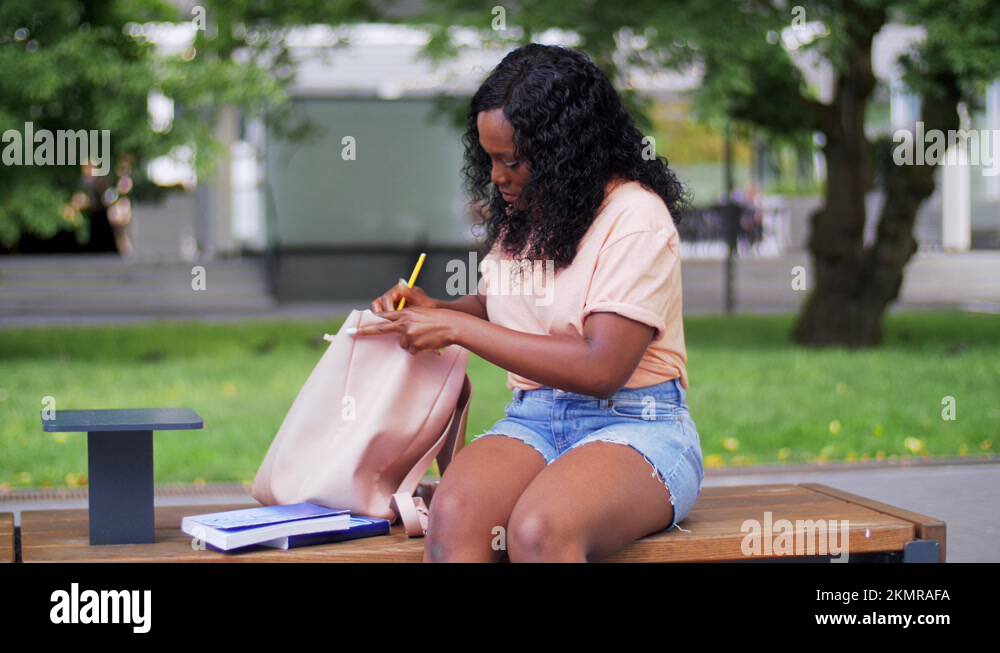 Girl packing books Stock Videos & Footage - HD and 4K Video Clips - Alamy