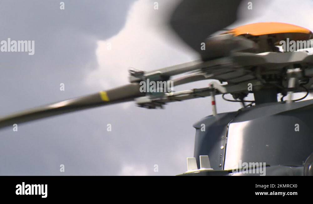 sequenced shots of rescue chopper taking off in mountaous terrain Stock ...