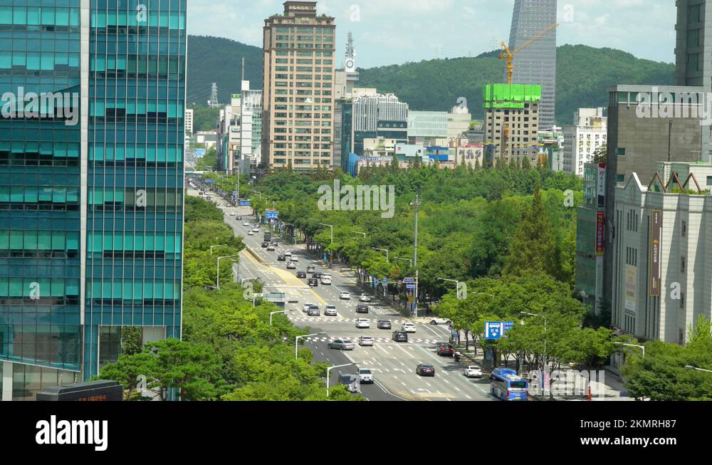 Traffic On City Road With High-rise Buildings In Daejeon, South Korea ...