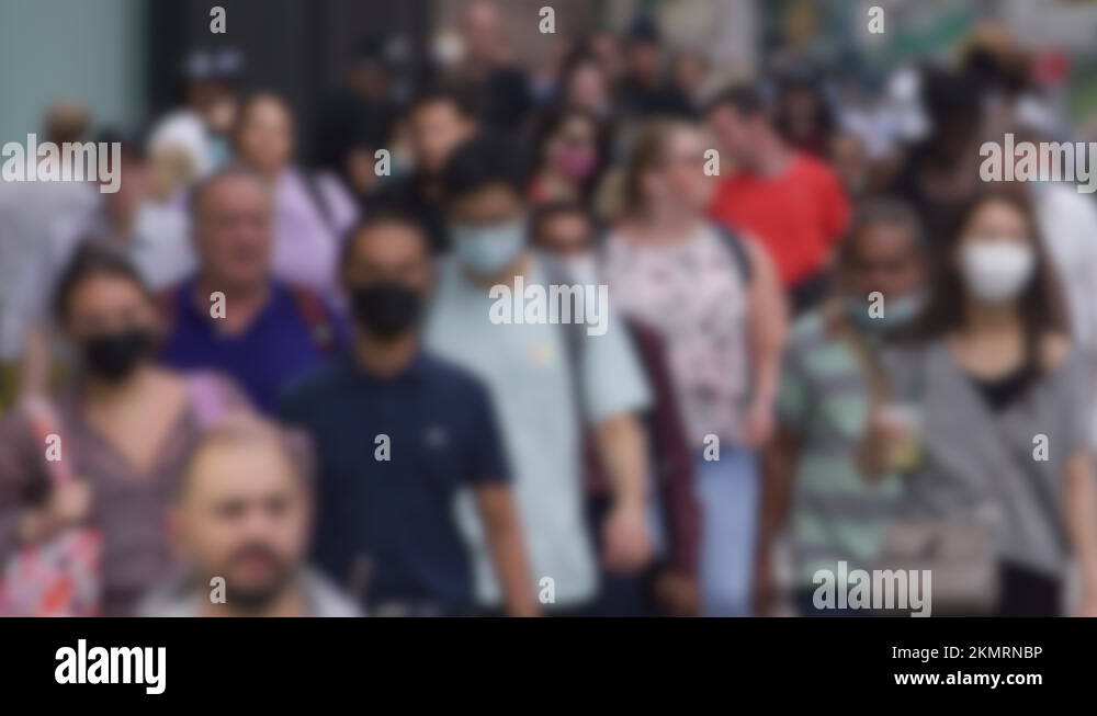 Crowd of people wearing mask masks walking street coronavirus covid-19 ...