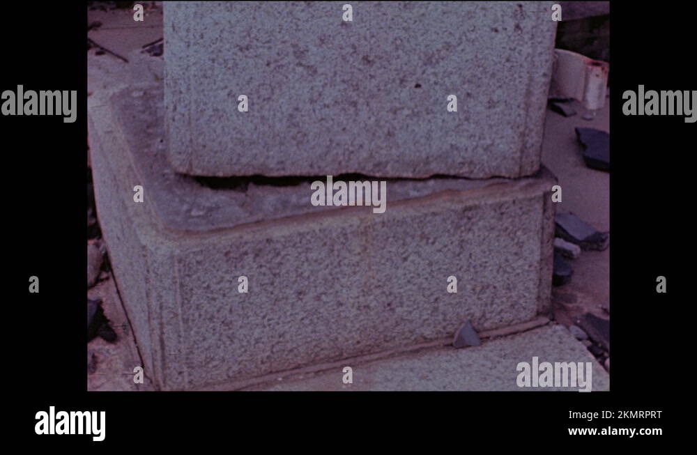 1940s: Damaged base of stone pilar in Hiroshima. Damaged base of stone ...