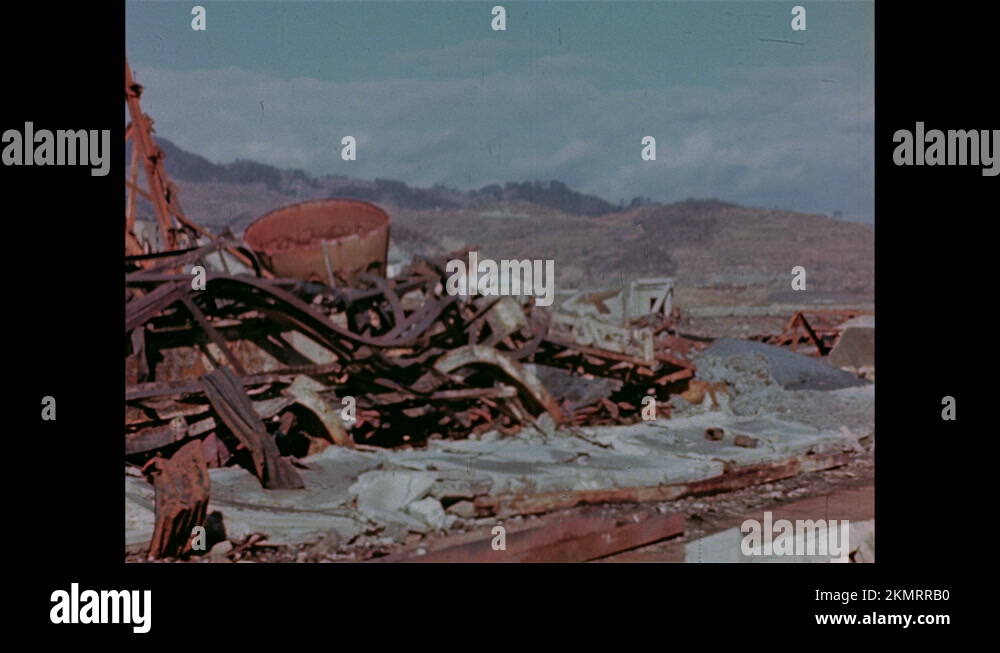 1940s: Pile of rusted, metal girders. Heap of metal girders from ... 1940s: Pile of rusted, metal girders. Heap of metal girders from ...