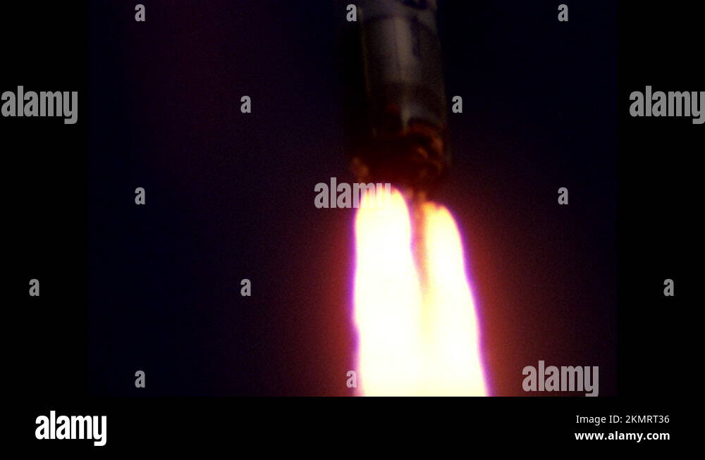 1960s: The twin boosters burn with bright flames as the missile rises ...